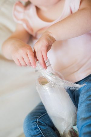 Ribbon Fine Motor Play for Toddlers - Hands On As We Grow®